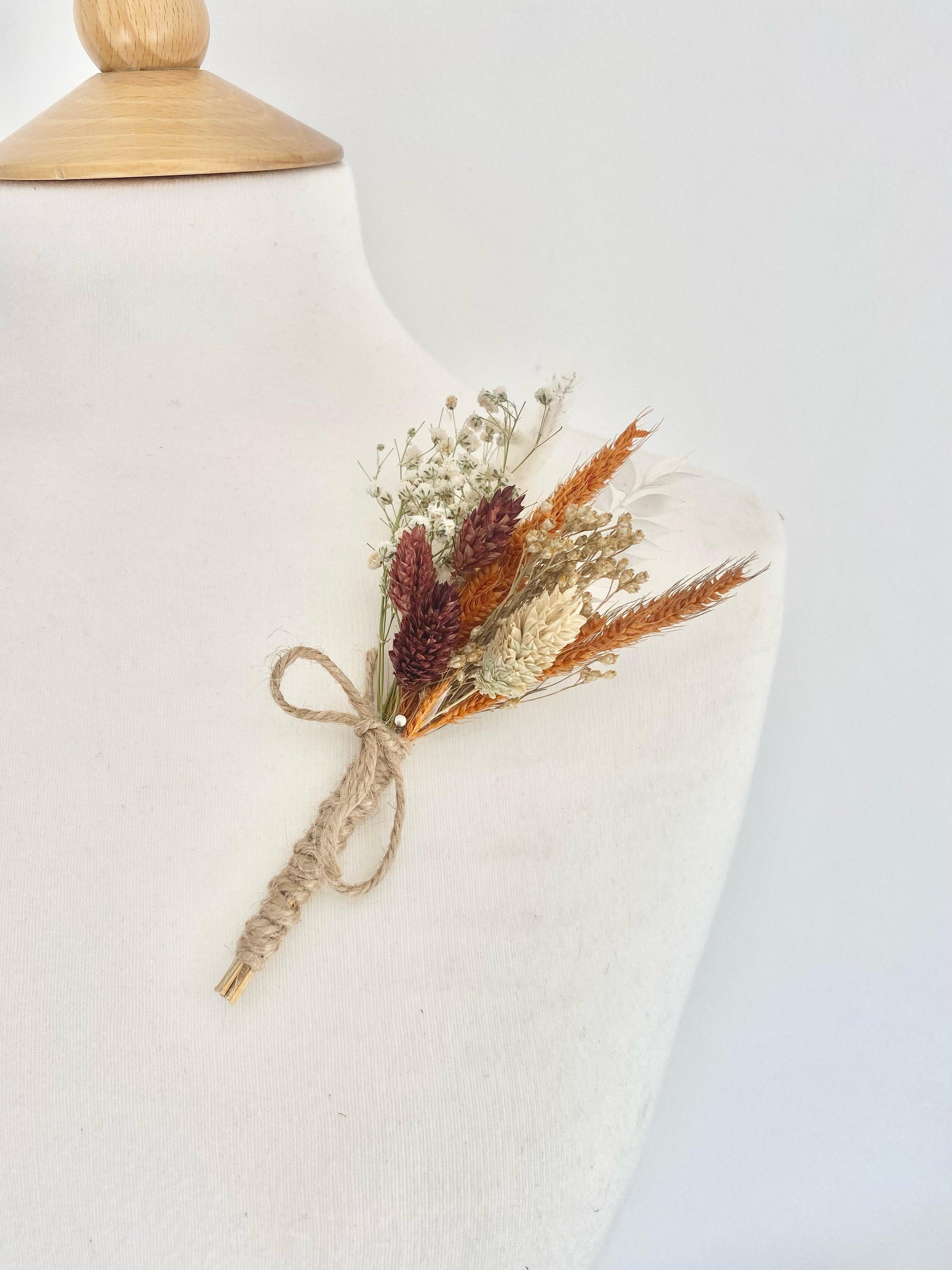 orange flower buttonhole